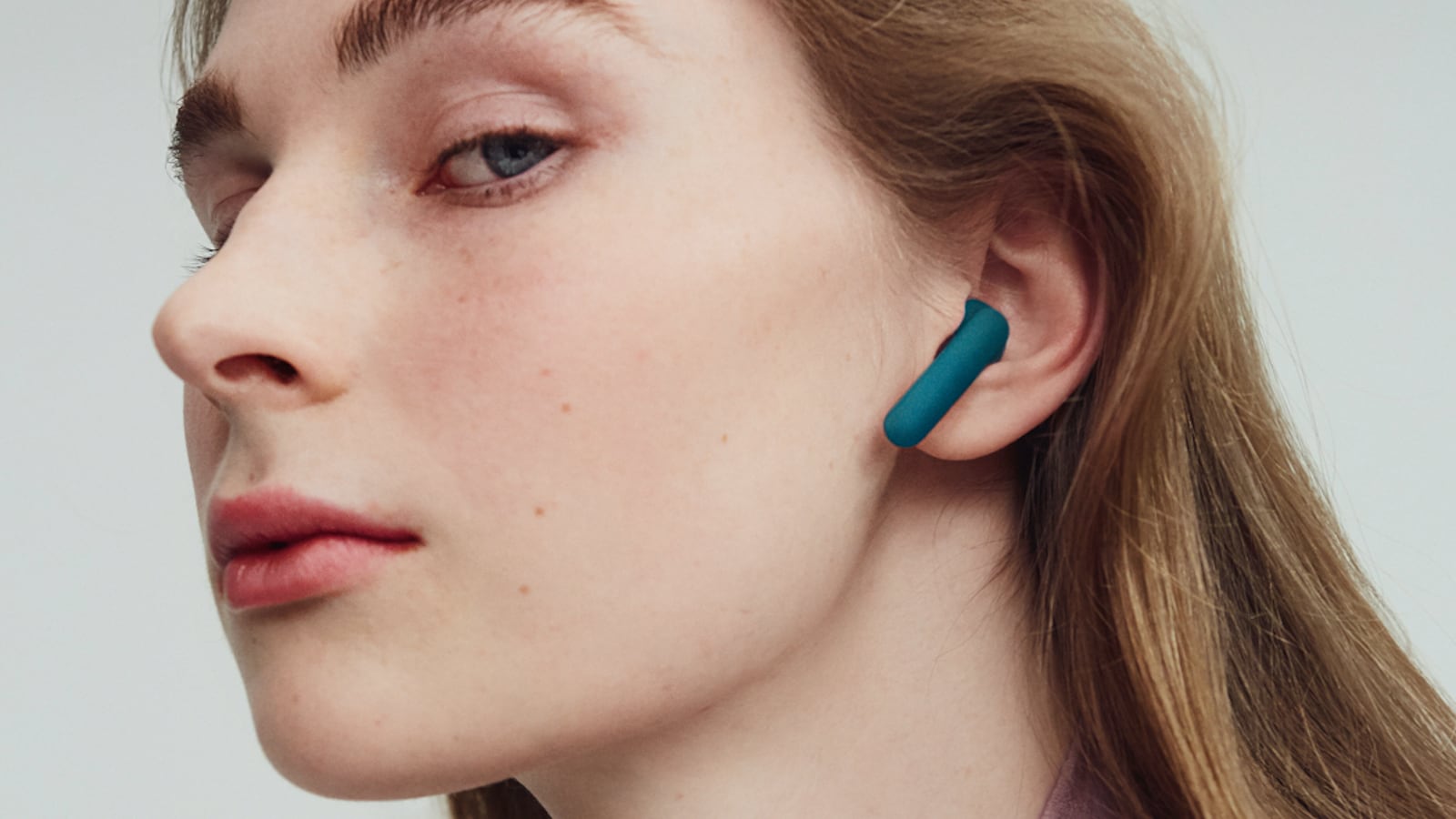 These Sleek Earbuds Can Handle Dust, Sweat, & Water