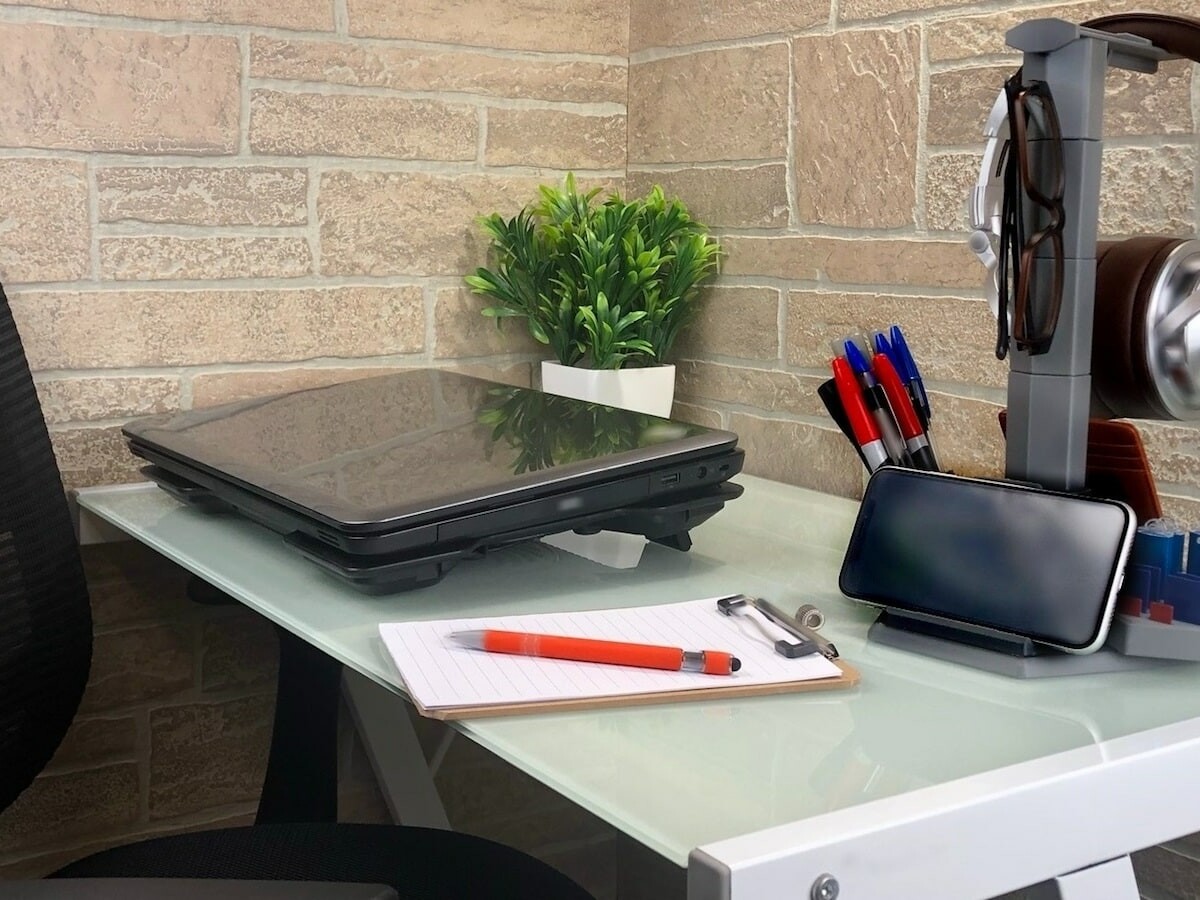The Cyber Stand desk modular organizer holds 25+ items such as phones ...