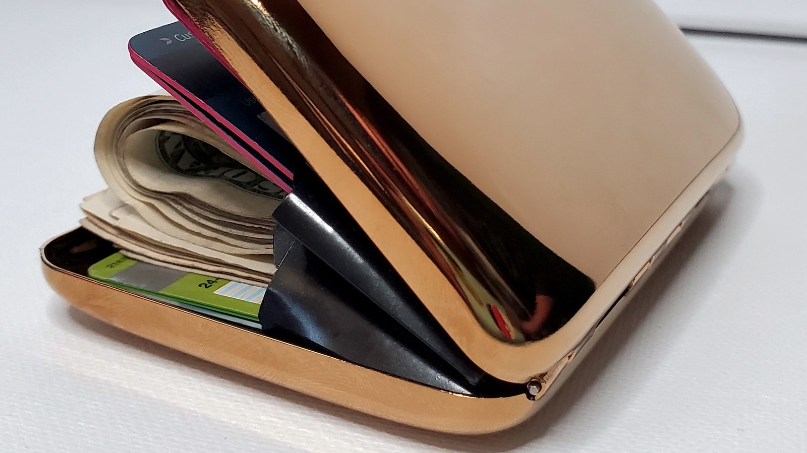 Copper Clean Wallet has a flashy look and self-sterilizing ...