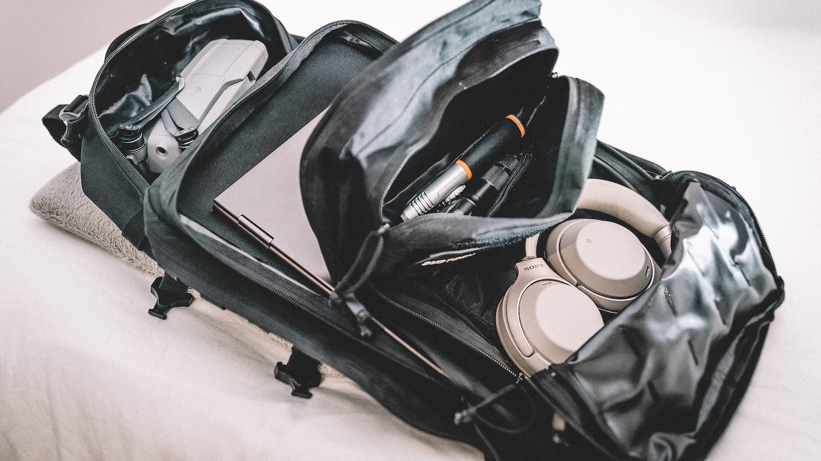 SUBTECH DRYPACK 38L Tactical Backpack retracts from 38 liters to 8 ...