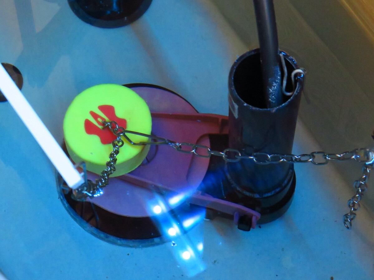 This automatic toilet flush system keeps you from touching toilet handles