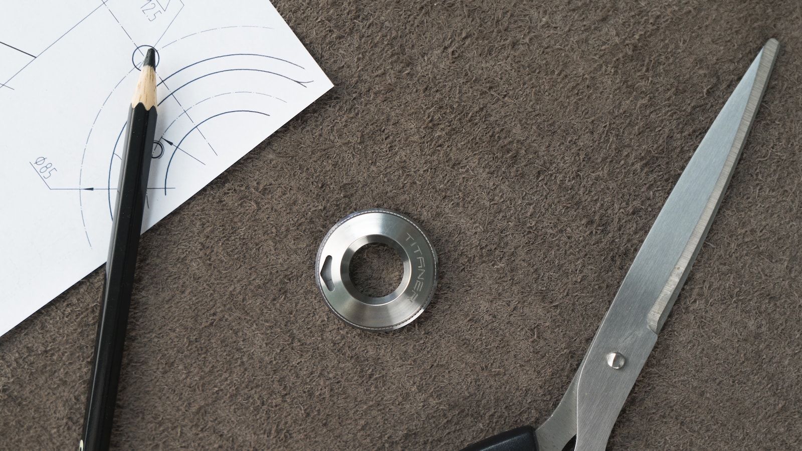 This titanium ruler redefines traditional measuring tools with versatility