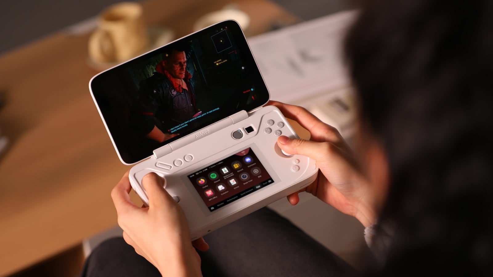 This dual-screen handheld has a Nintendo DS–inspired design