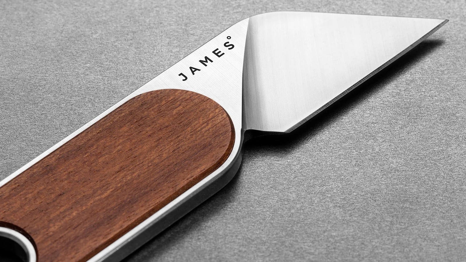 This fixed-blade knife has upcycled vinyl colorways