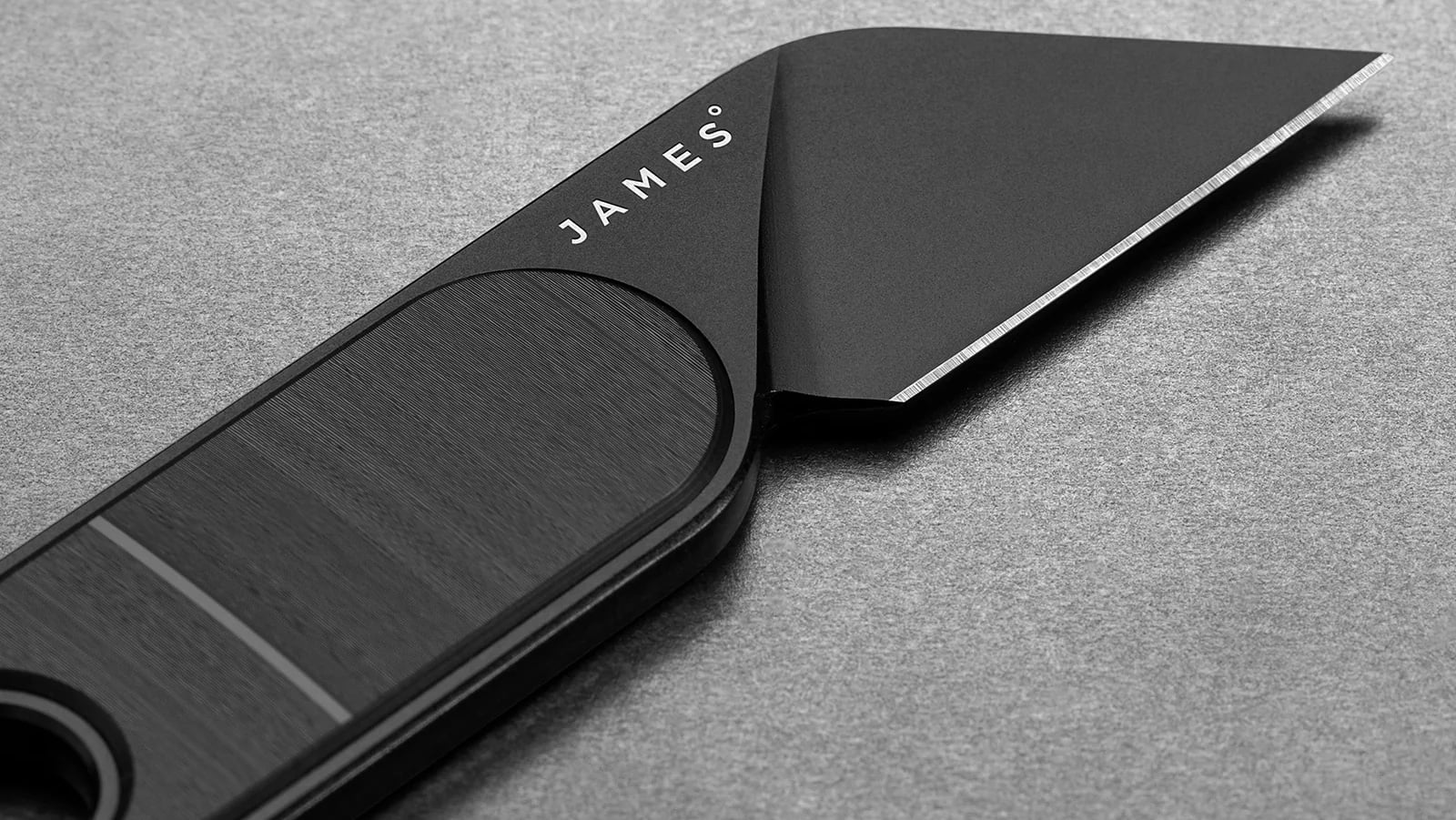 This fixed-blade knife has upcycled vinyl colorways