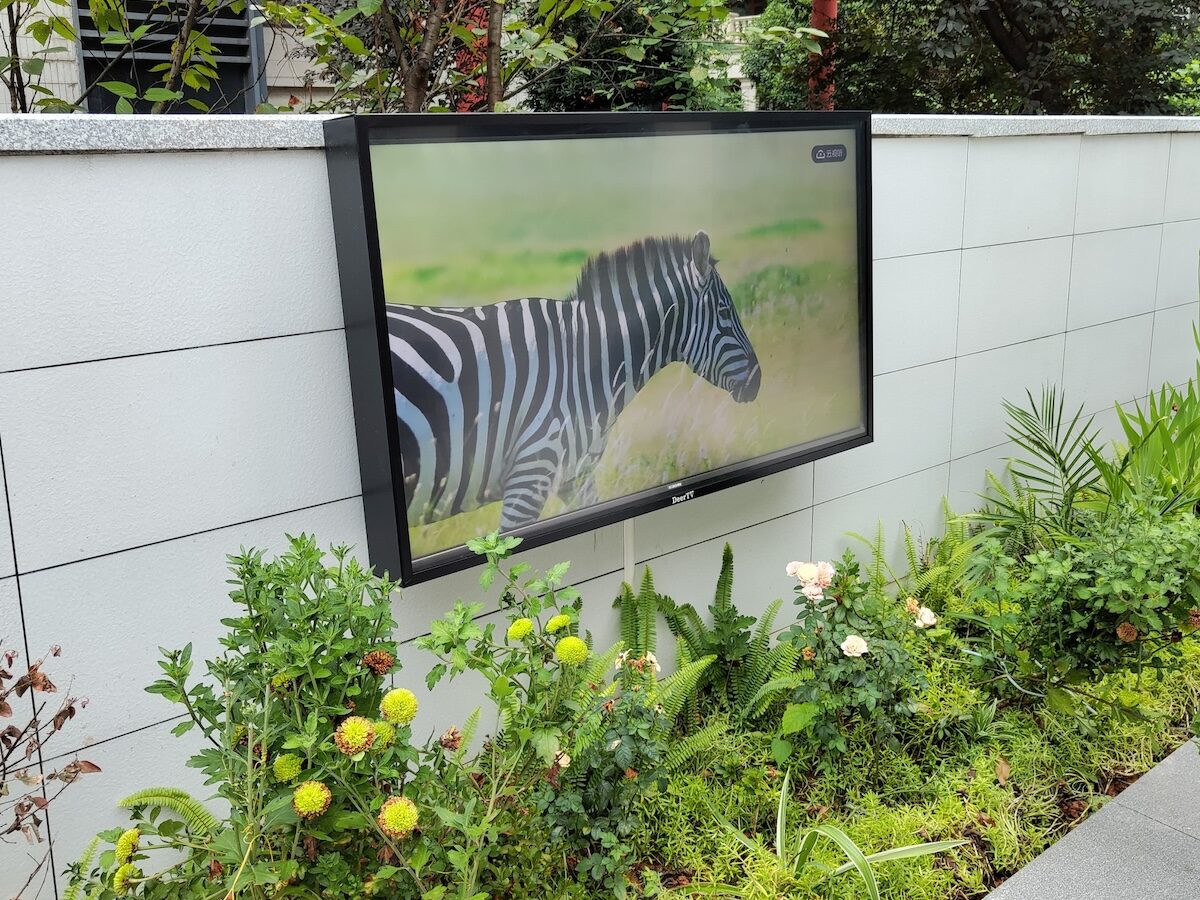 This Weatherproof Outdoor TV Enclosure is a must for outdoors